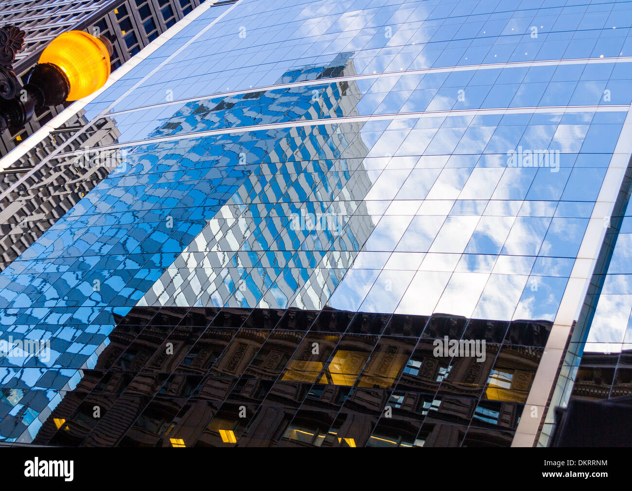 reflection of skyscraper in window Stock Photo - Alamy