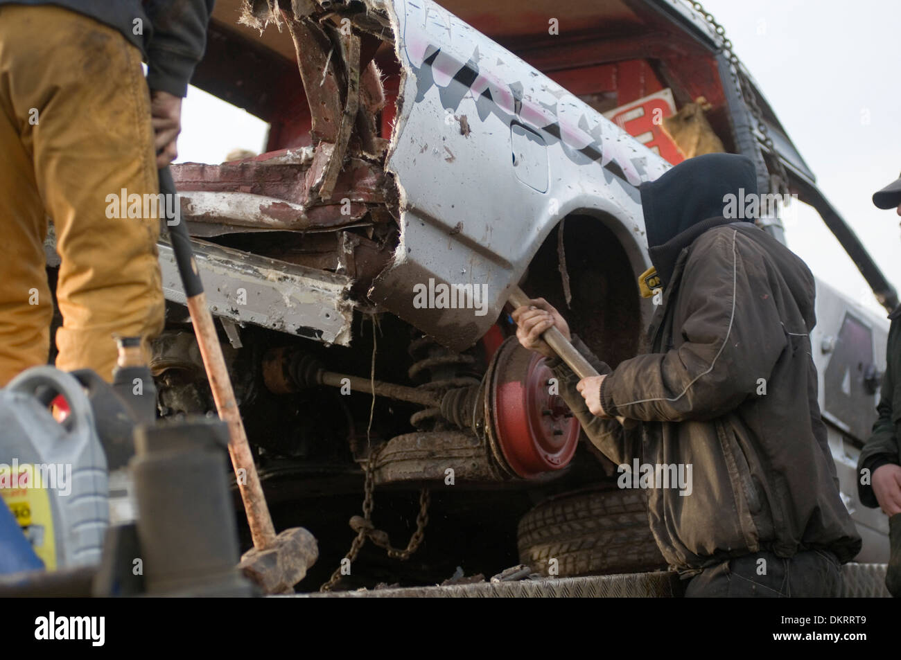 banger racing mechanic repairing the bodywork on stock car cars with a ...