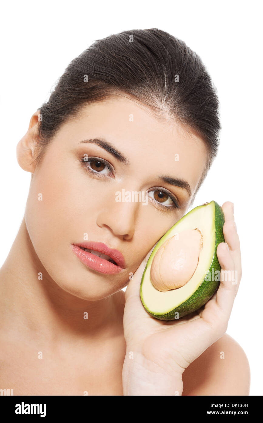 Beautiful woman's face with avocado. Isolated on white Stock Photo - Alamy
