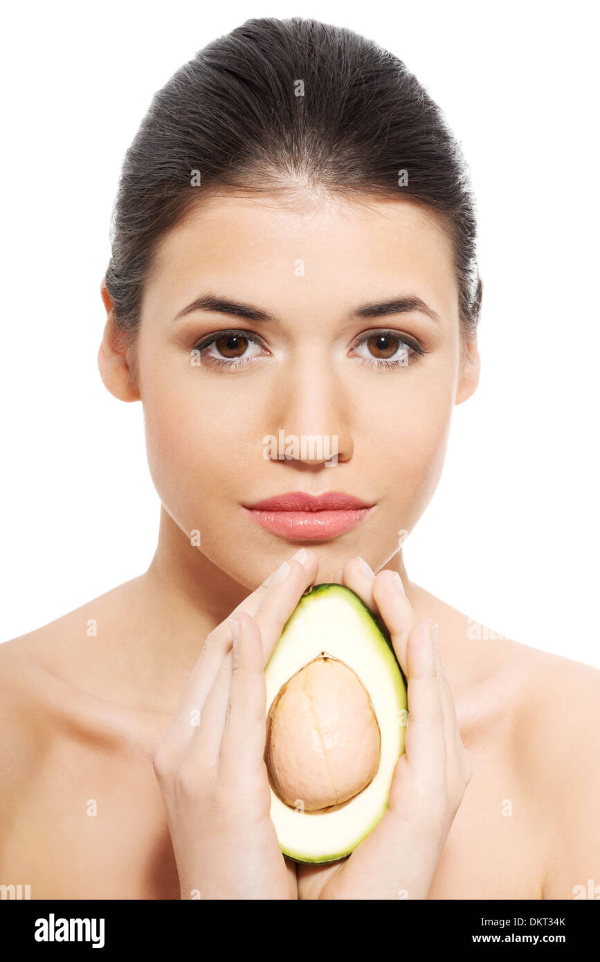 Beautiful woman's face with avocado. Isolated on white Stock Photo - Alamy
