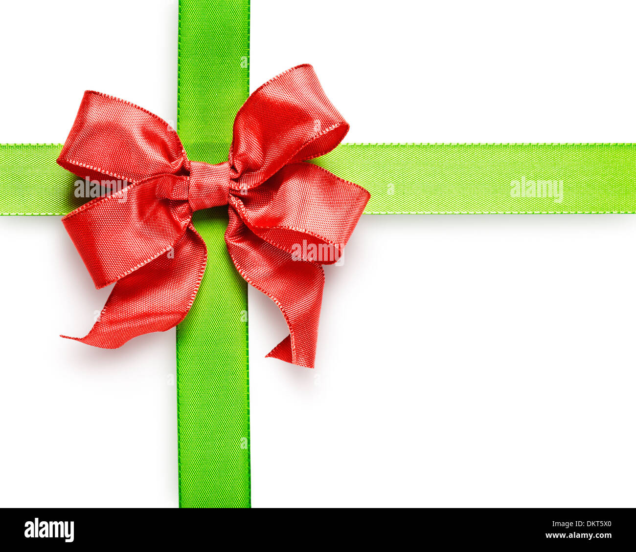 Red bow with green ribbon isolated on white background clipping path ...