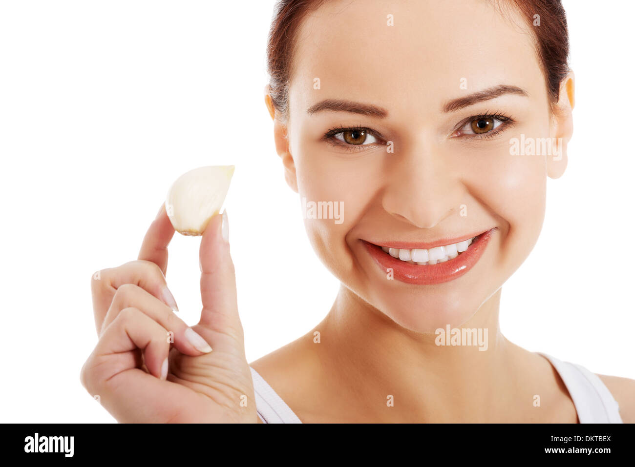 Beautiful woman holding garlic. Isolated on white Stock Photo - Alamy