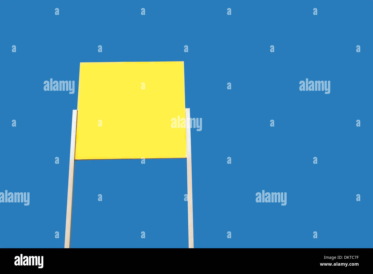 yellow clear signboard against blue background with copy space Stock ...