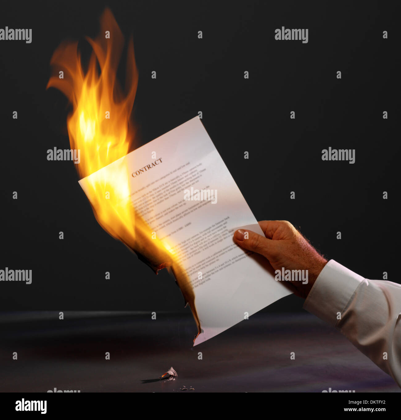 Burning a Contract Stock Photo - Alamy