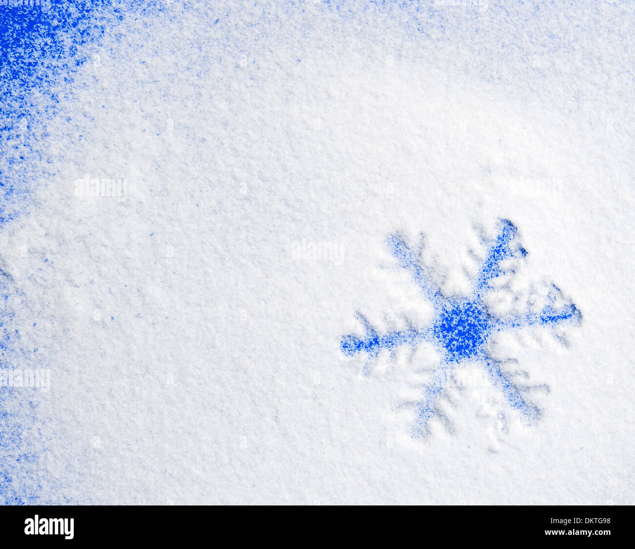 Snowflake on the snow Stock Photo - Alamy