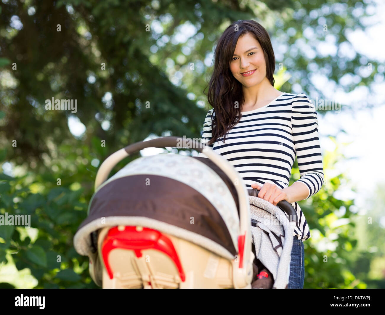 Mom pushing stroller hi-res stock photography and images - Alamy