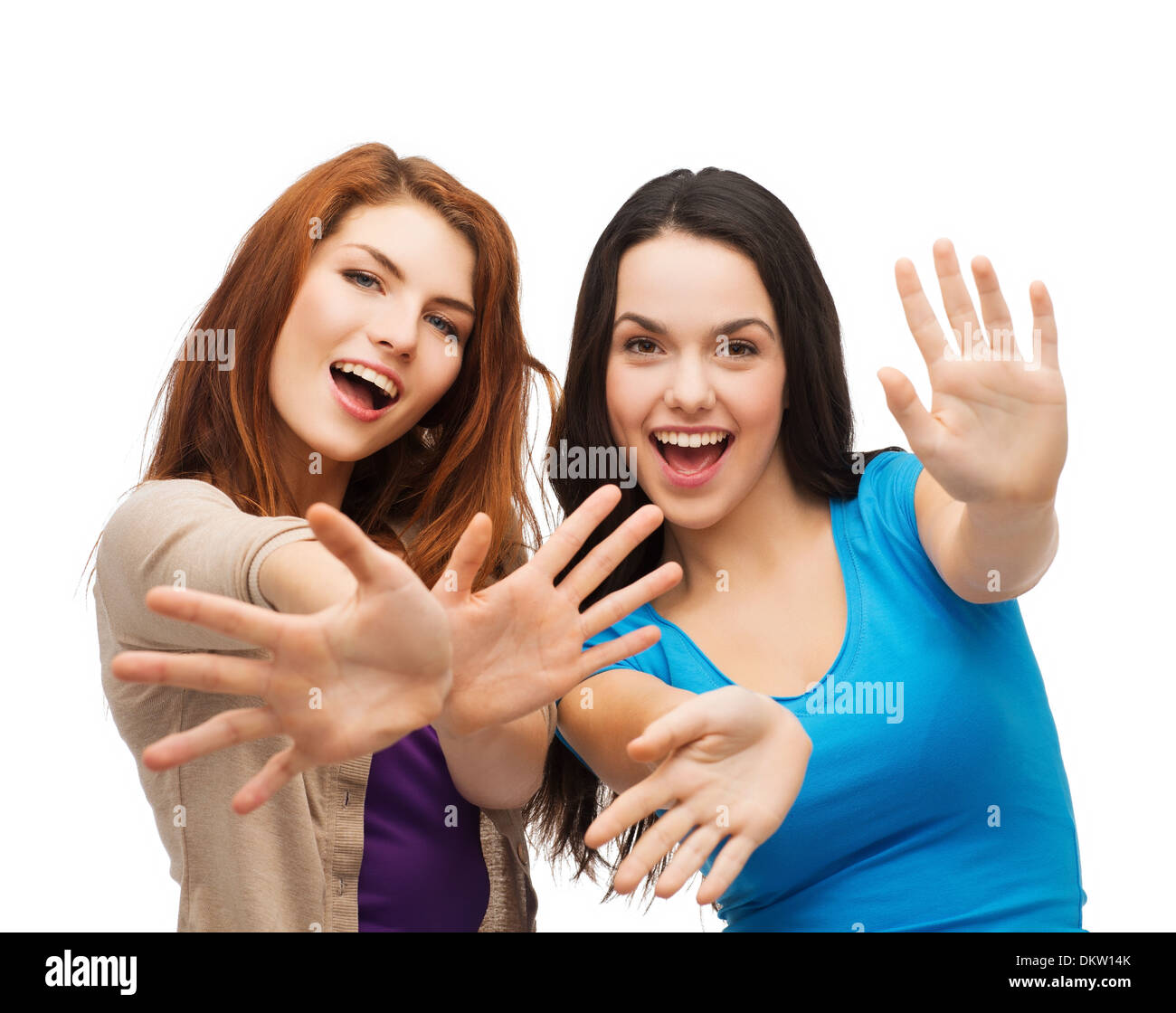 two smiling girls showing their palms Stock Photo - Alamy