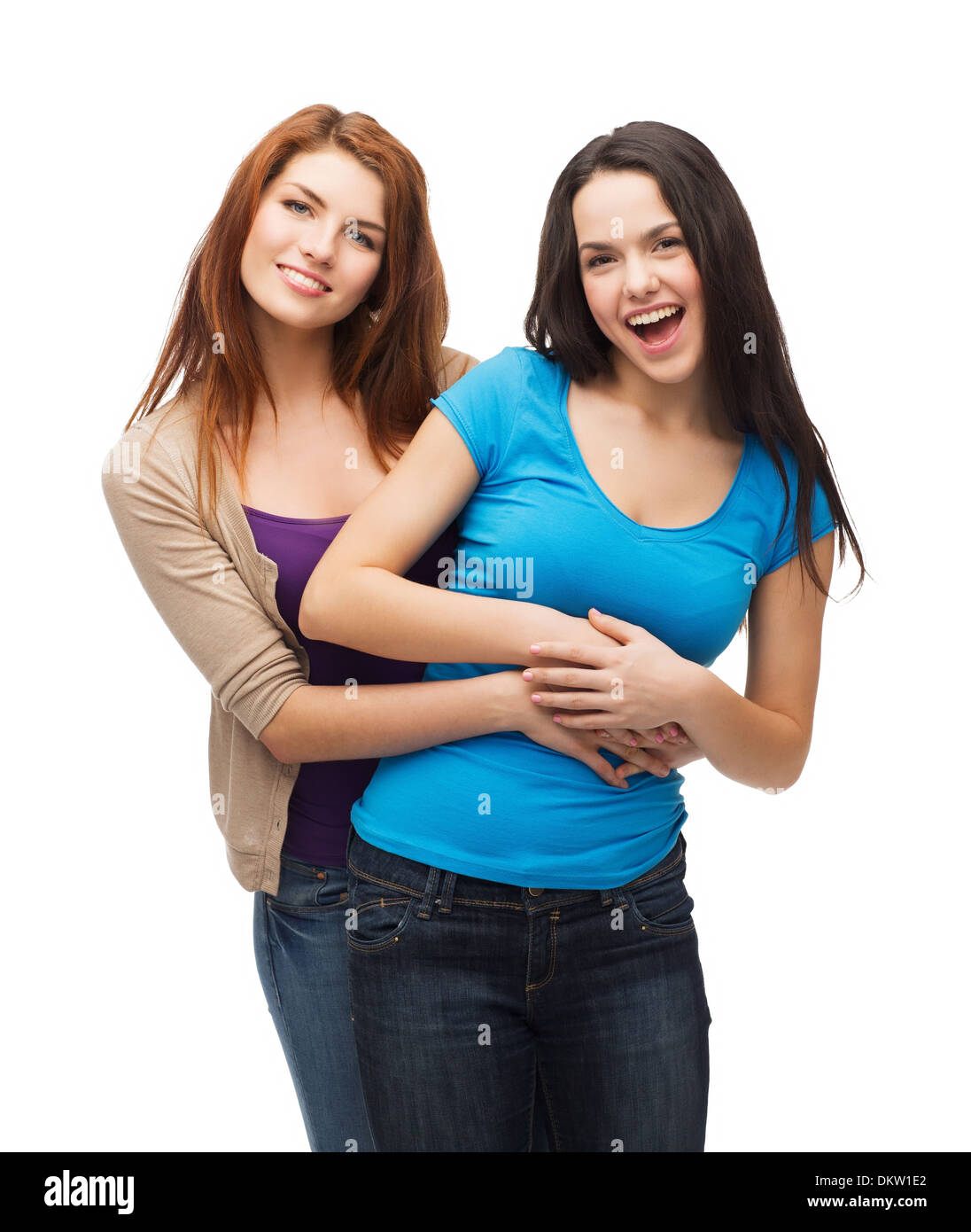 two laughing girls hugging Stock Photo - Alamy