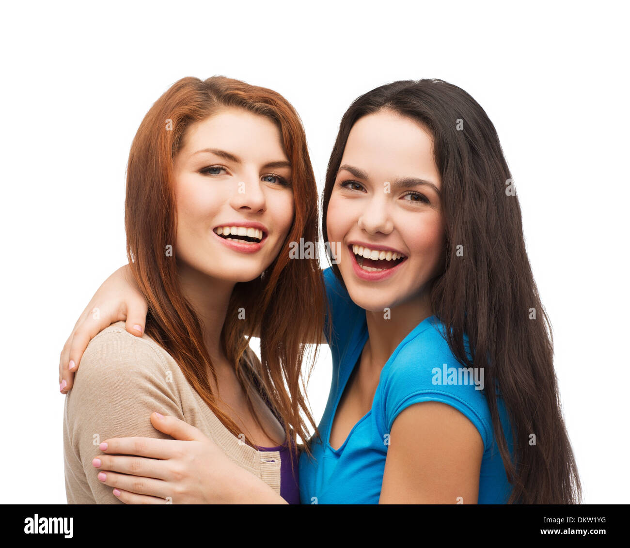 two laughing girls hugging Stock Photo - Alamy