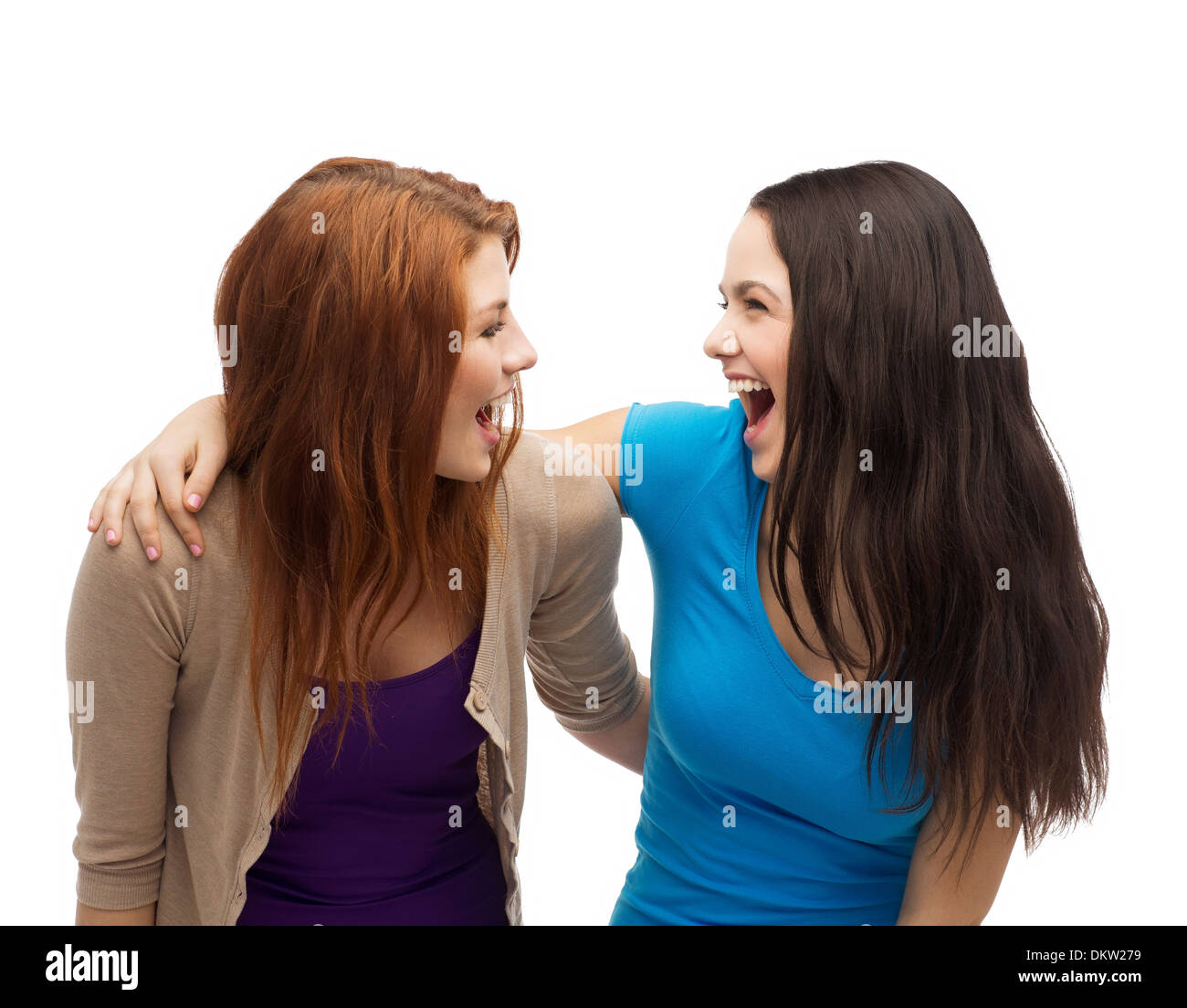 Two girlfriends laughing together Cut Out Stock Images & Pictures - Alamy