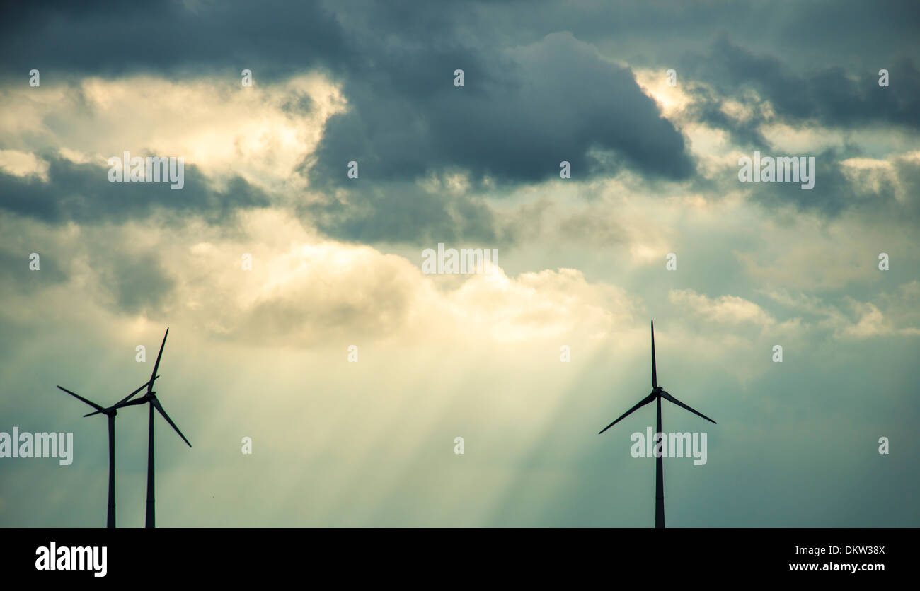 Wind mills in sun rays Stock Photo - Alamy