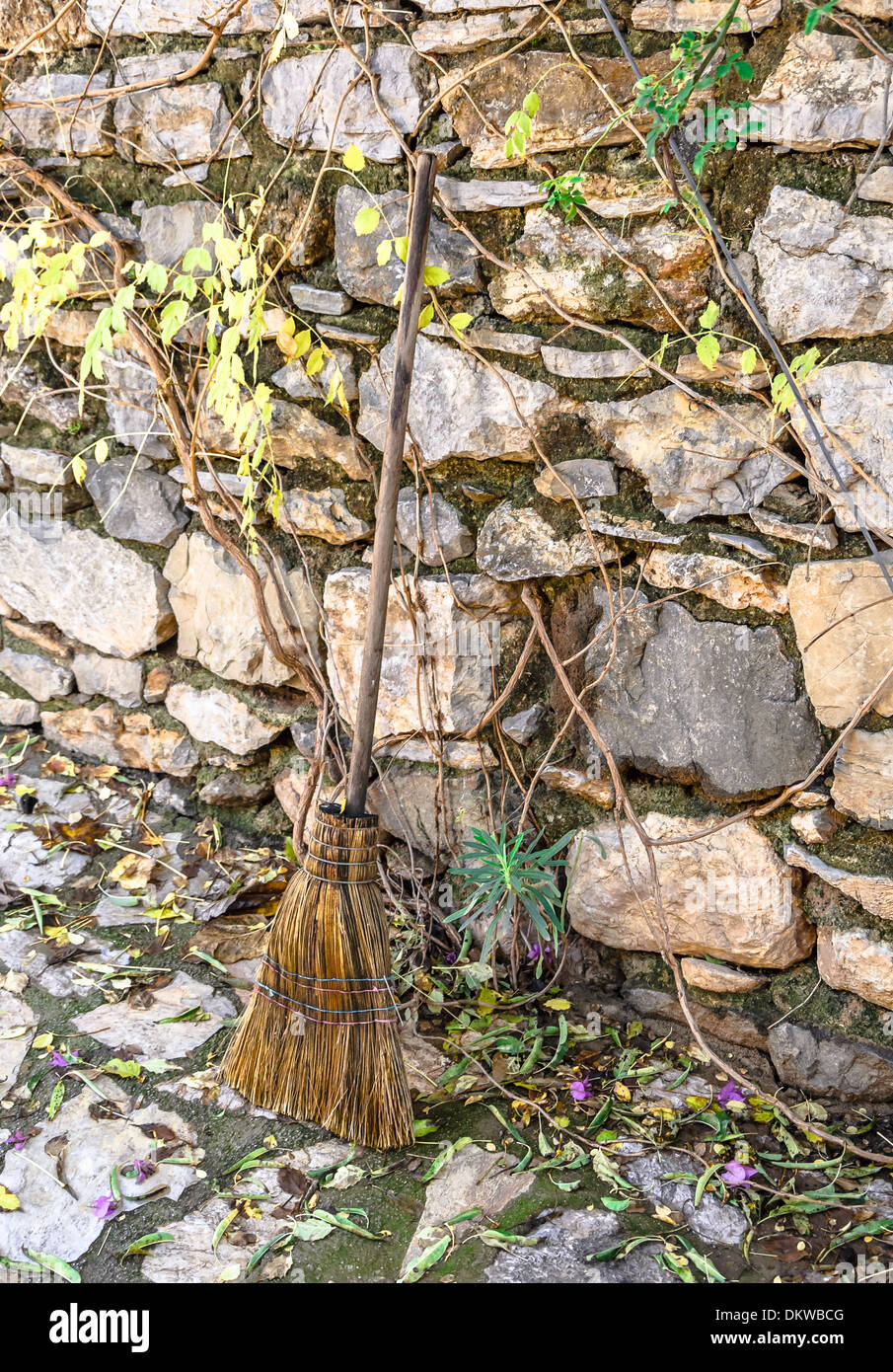 Sweeping broom on paving stones Stock Photo - Alamy
