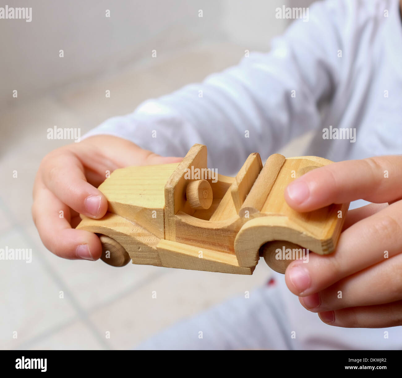 Boy holding toy car hi-res stock photography and images - Alamy