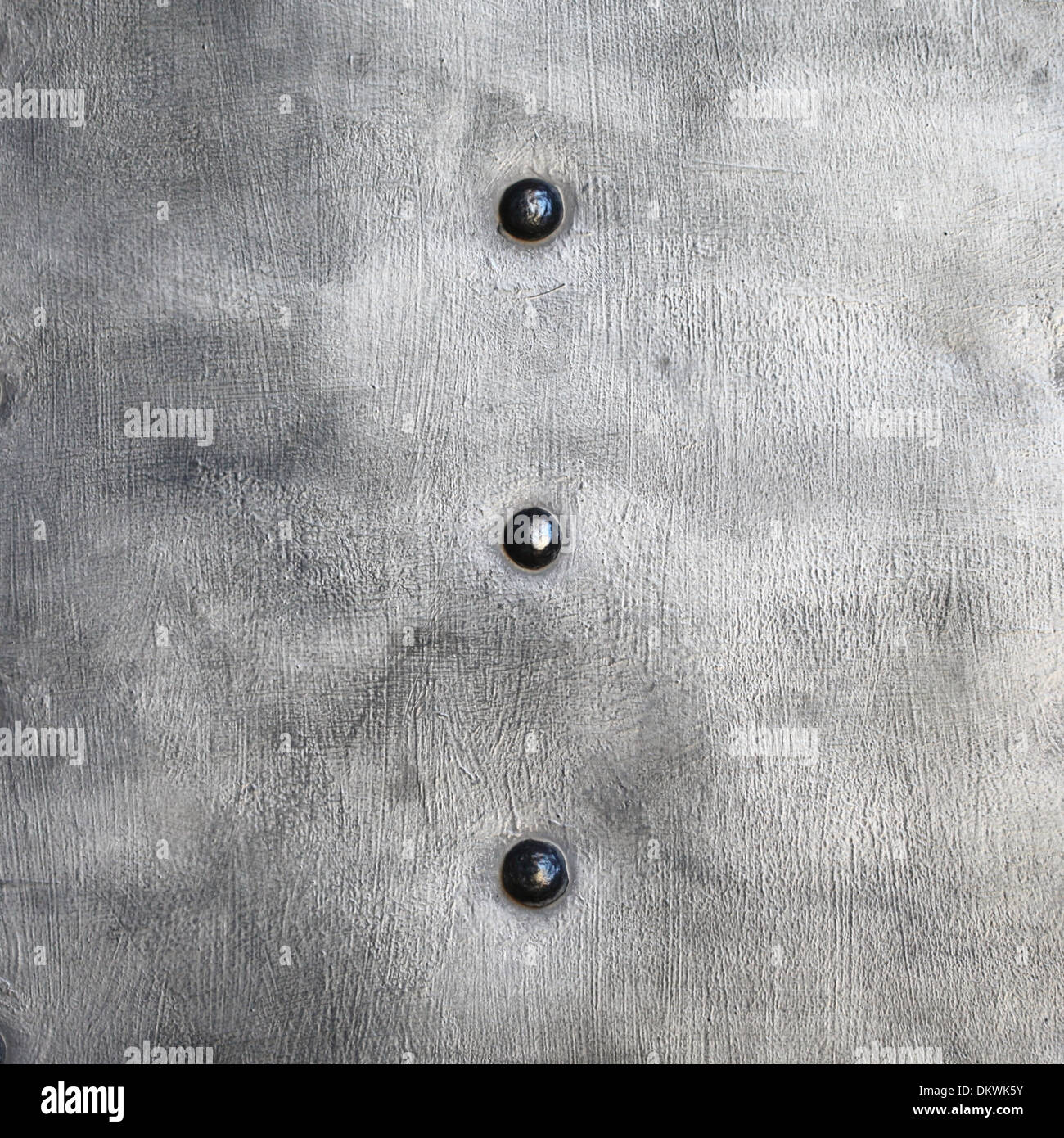 Black grunge metal plate or armour texture with rivets as background ...