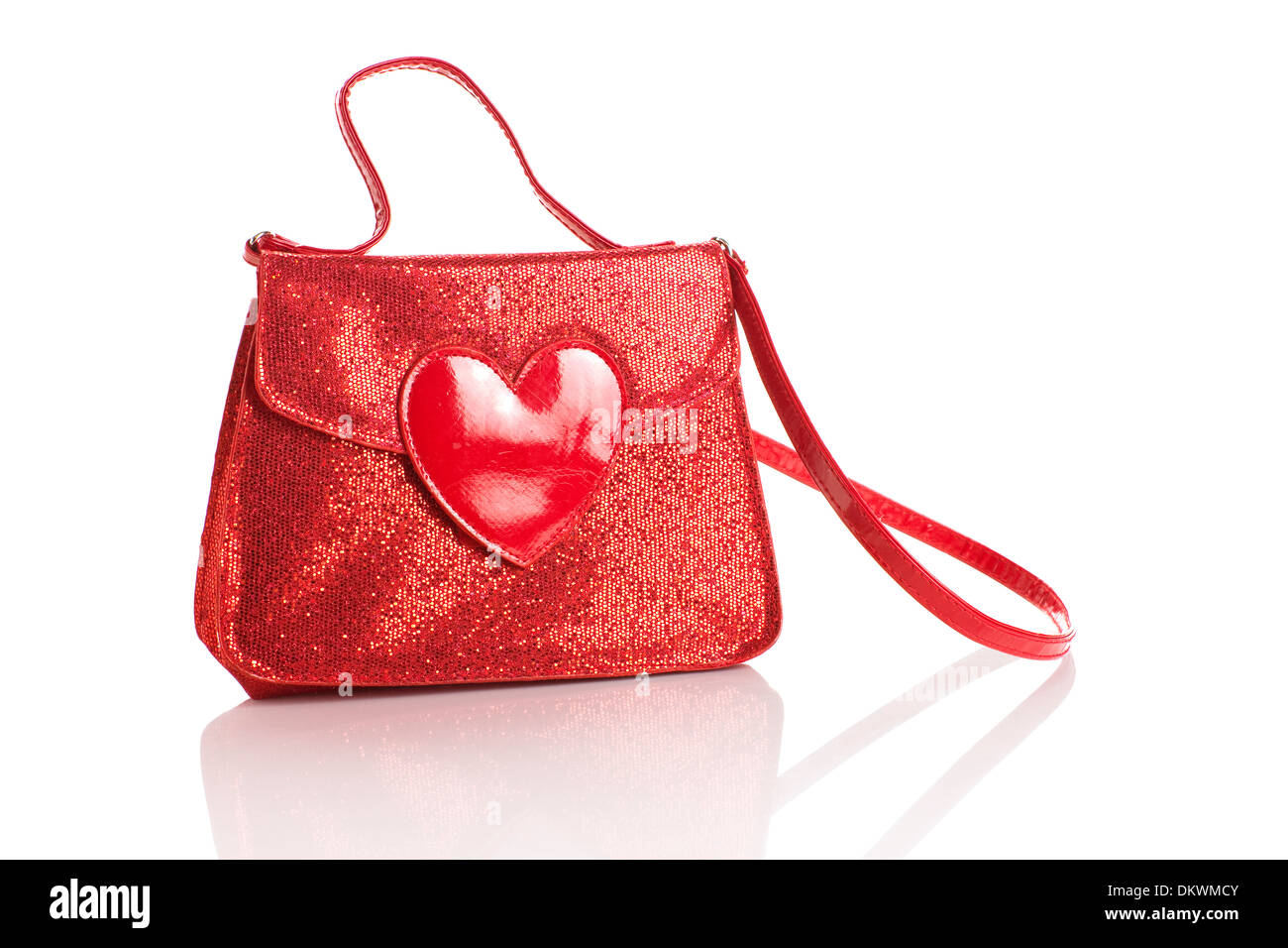 red sequin handbag with heart isolated on white background with ...