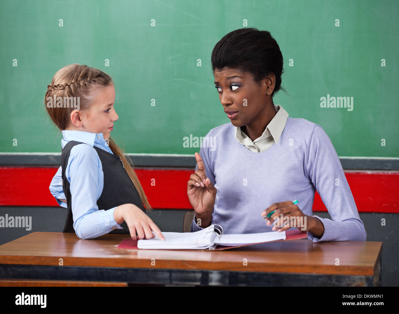 Teacher scolding student hi-res stock photography and images - Alamy