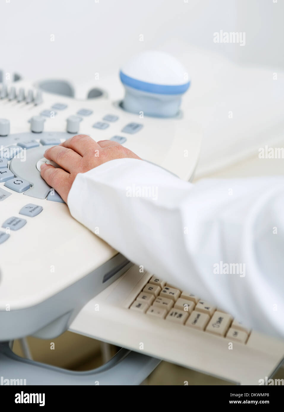 Doctor's Hand Using Ultrasound Machine Stock Photo - Alamy
