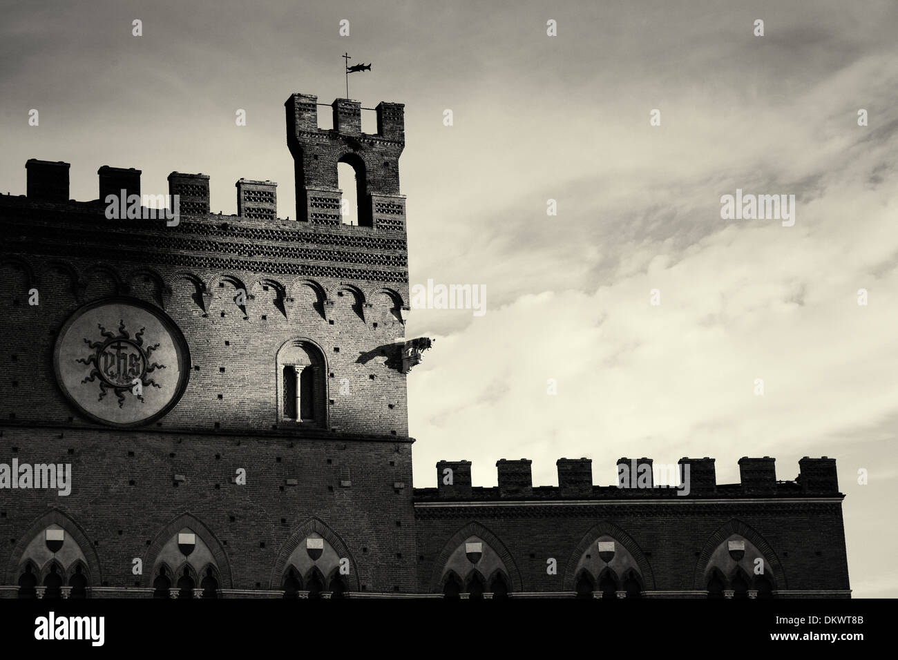 Setting autumn sun on the Palazzo Pubblico in Siena, Italy Stock Photo ...