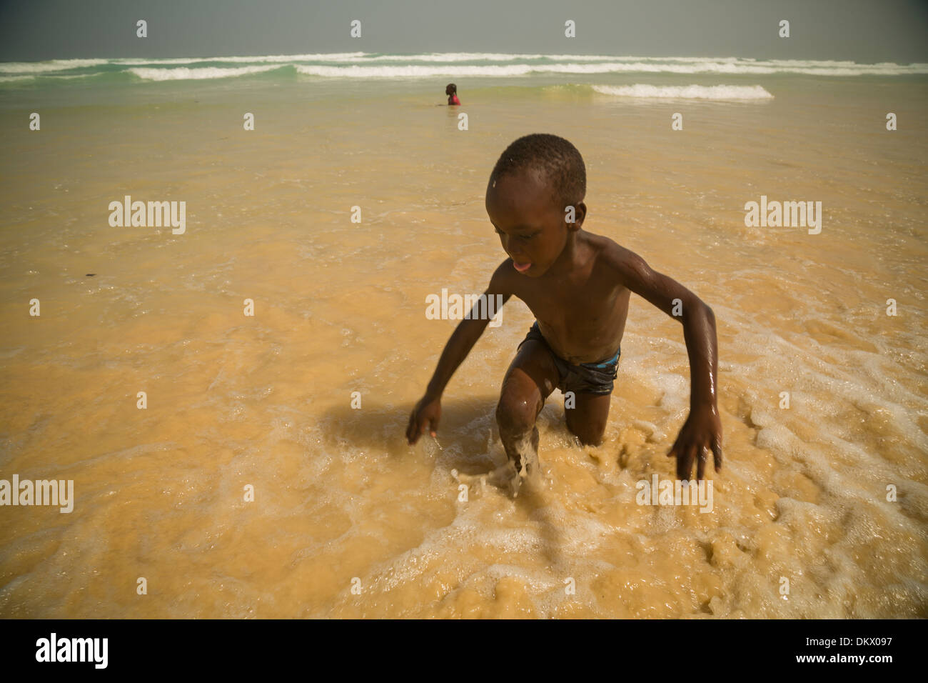 Boy Swimming In Ocean