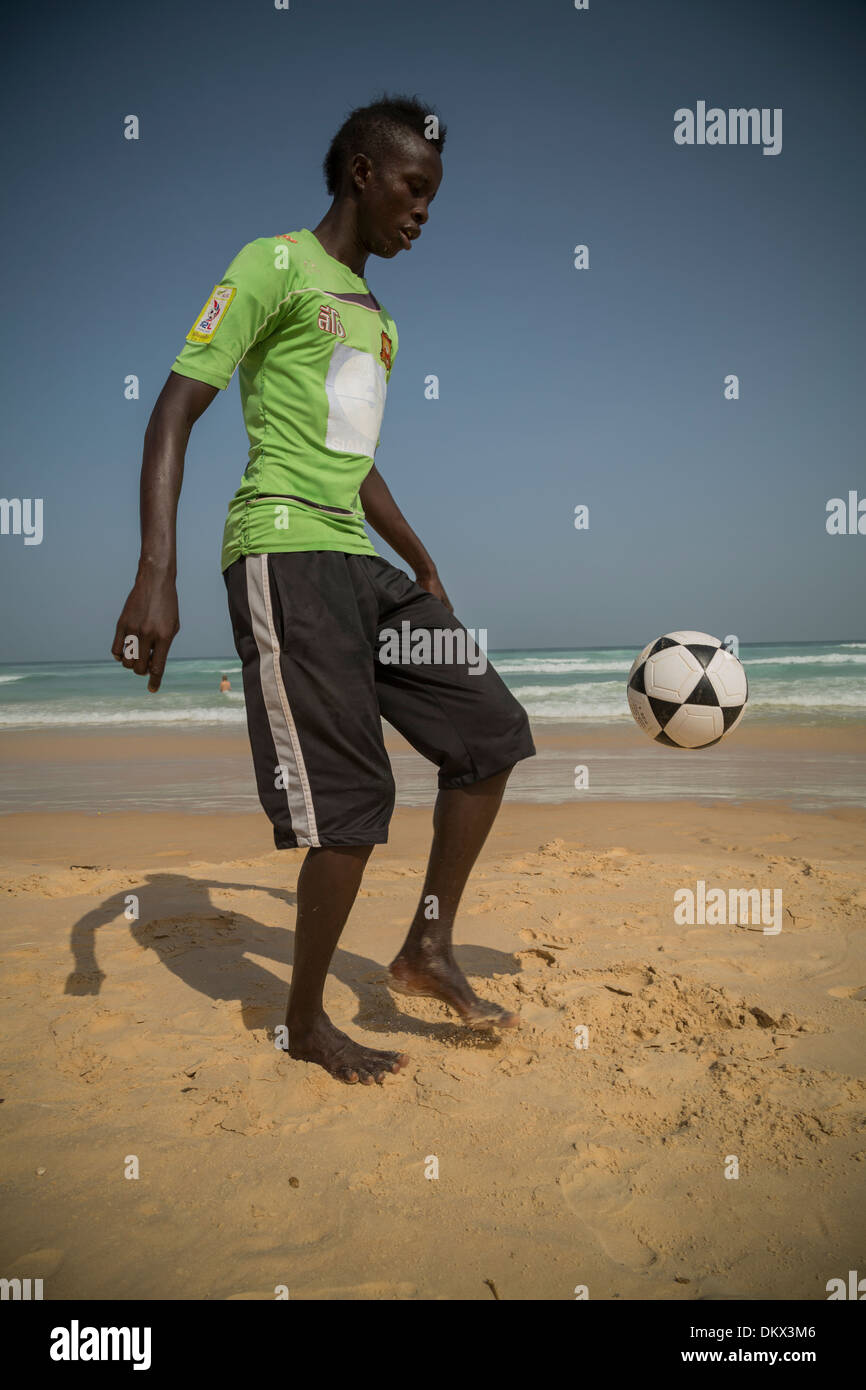 Football player on the beach in Dakar, Senegal Stock Photo - Alamy