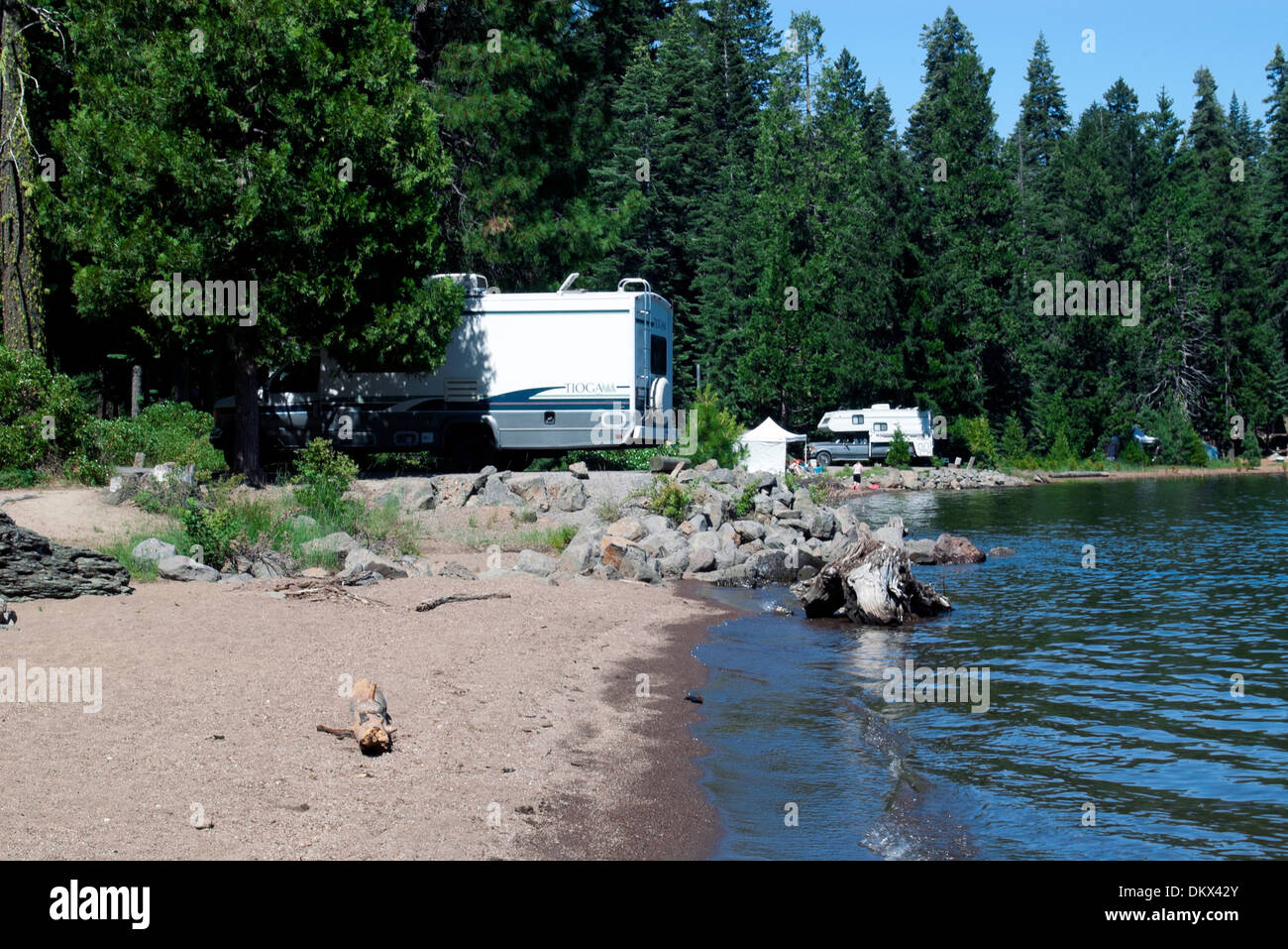 Lake Almanor motorhomes, RVs, parked at edge of beach, in campground ...