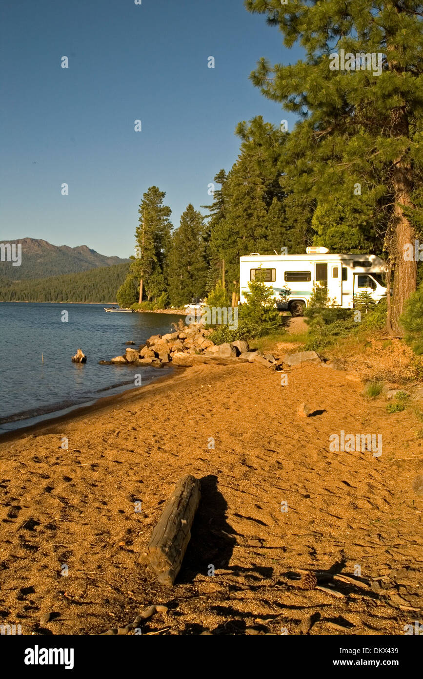 Lake Almanor motorhome, RV, parked at edge of beach, in campground at ...