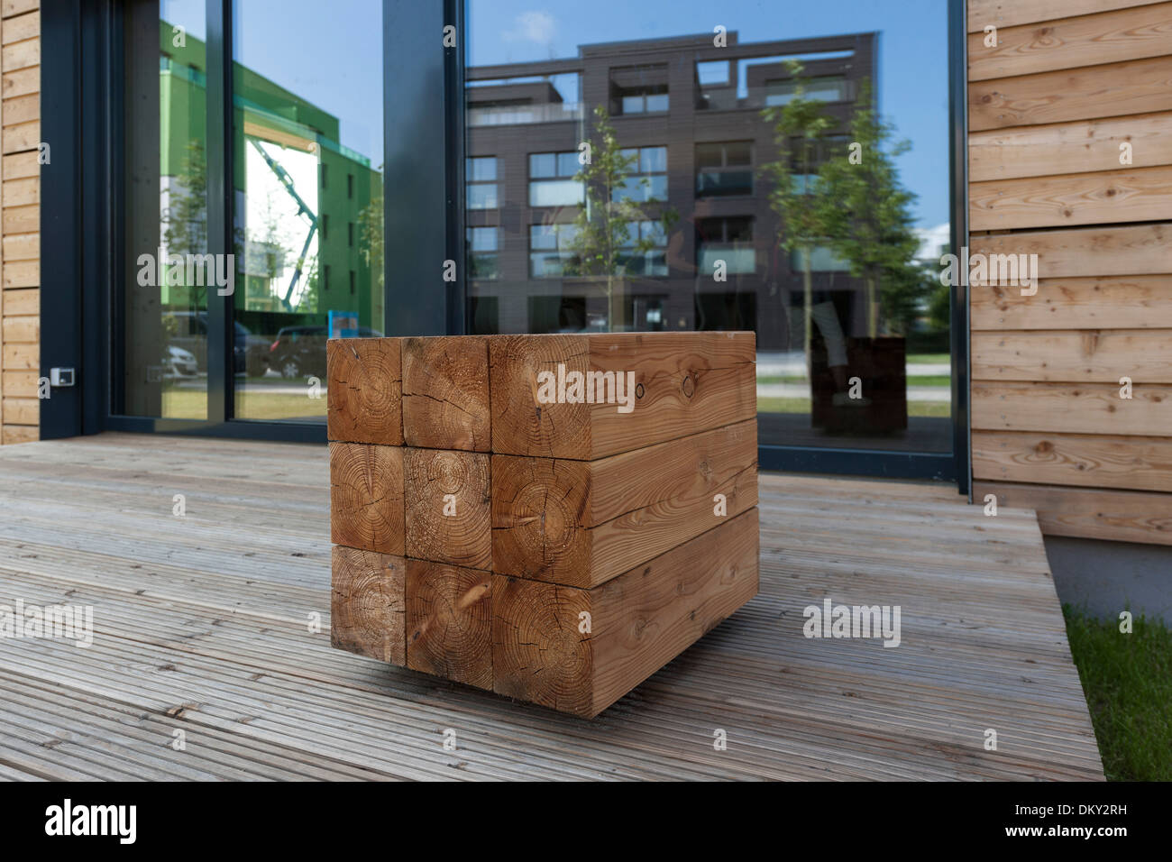 Wood as building material in front of a wooden house, IBA Hamburg ...