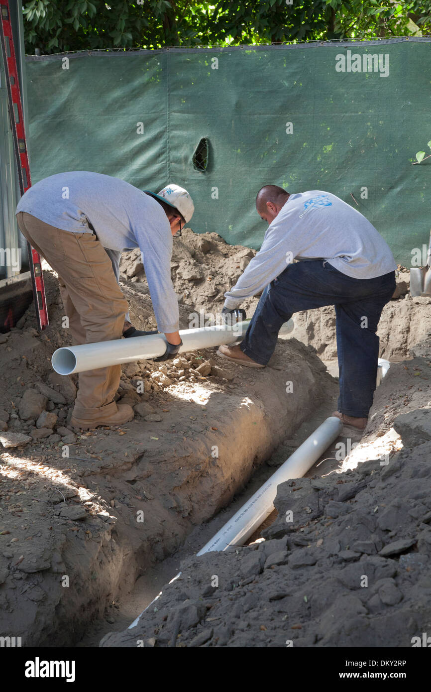Poly Vinyl Chloride (PVC) Pipes being installed for rainwater ...