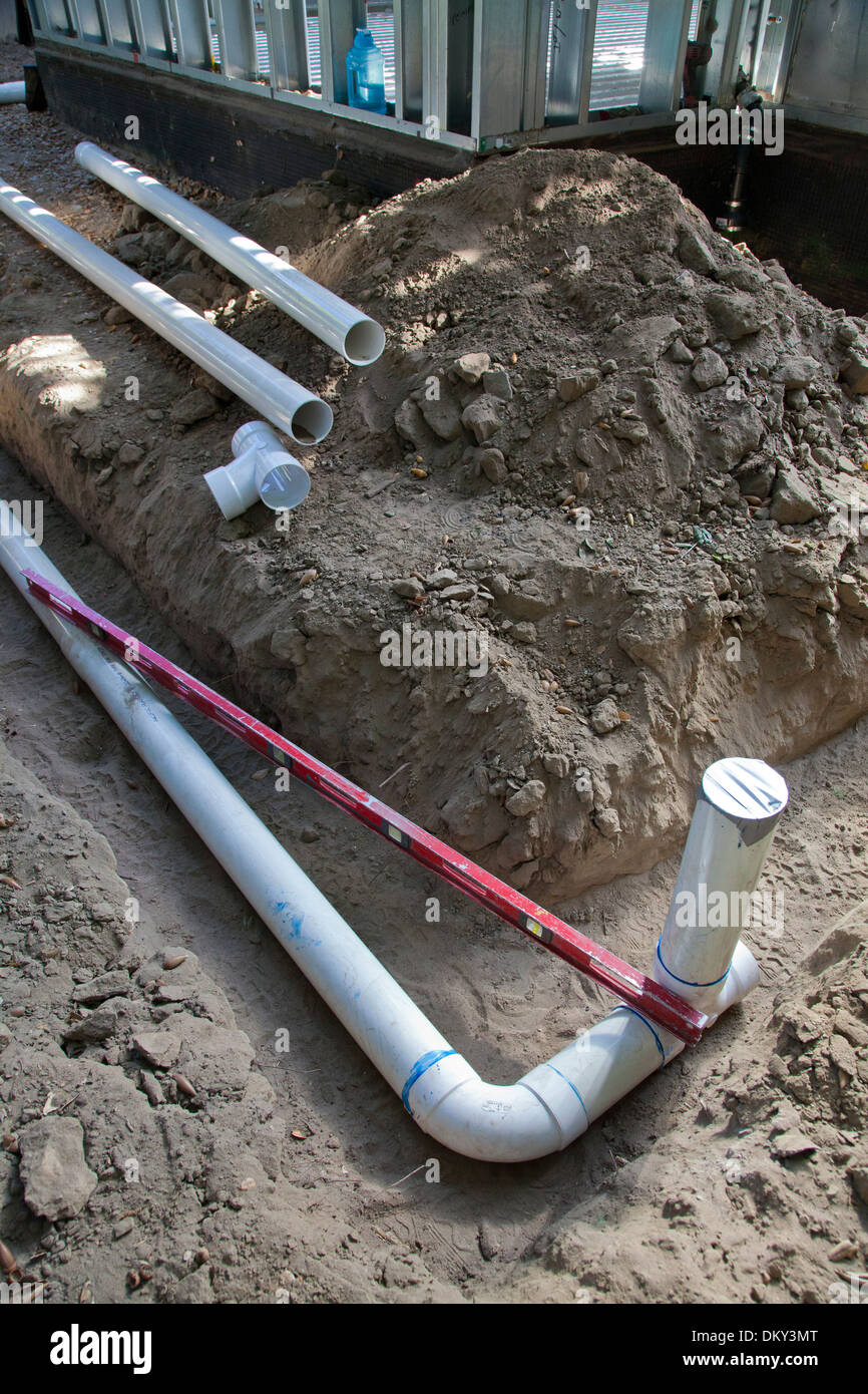 Poly Vinyl Chloride, PVC Pipes being installed for rainwater harvesting ...