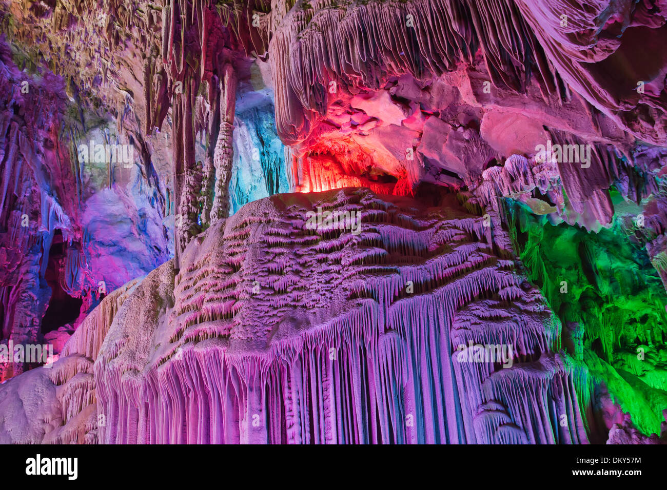 colorful limestone cave with perfect reflections in water Stock Photo ...