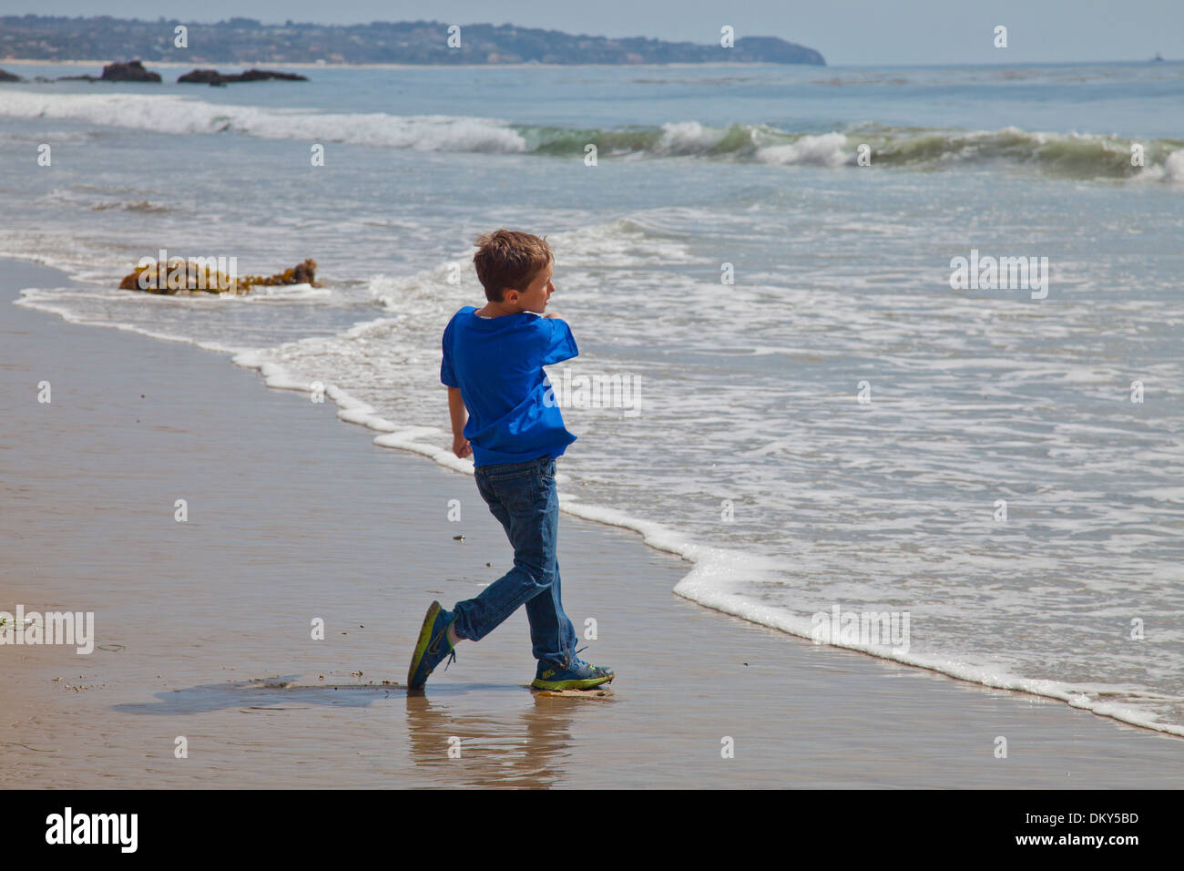 Boy throwing rocks hi-res stock photography and images - Alamy