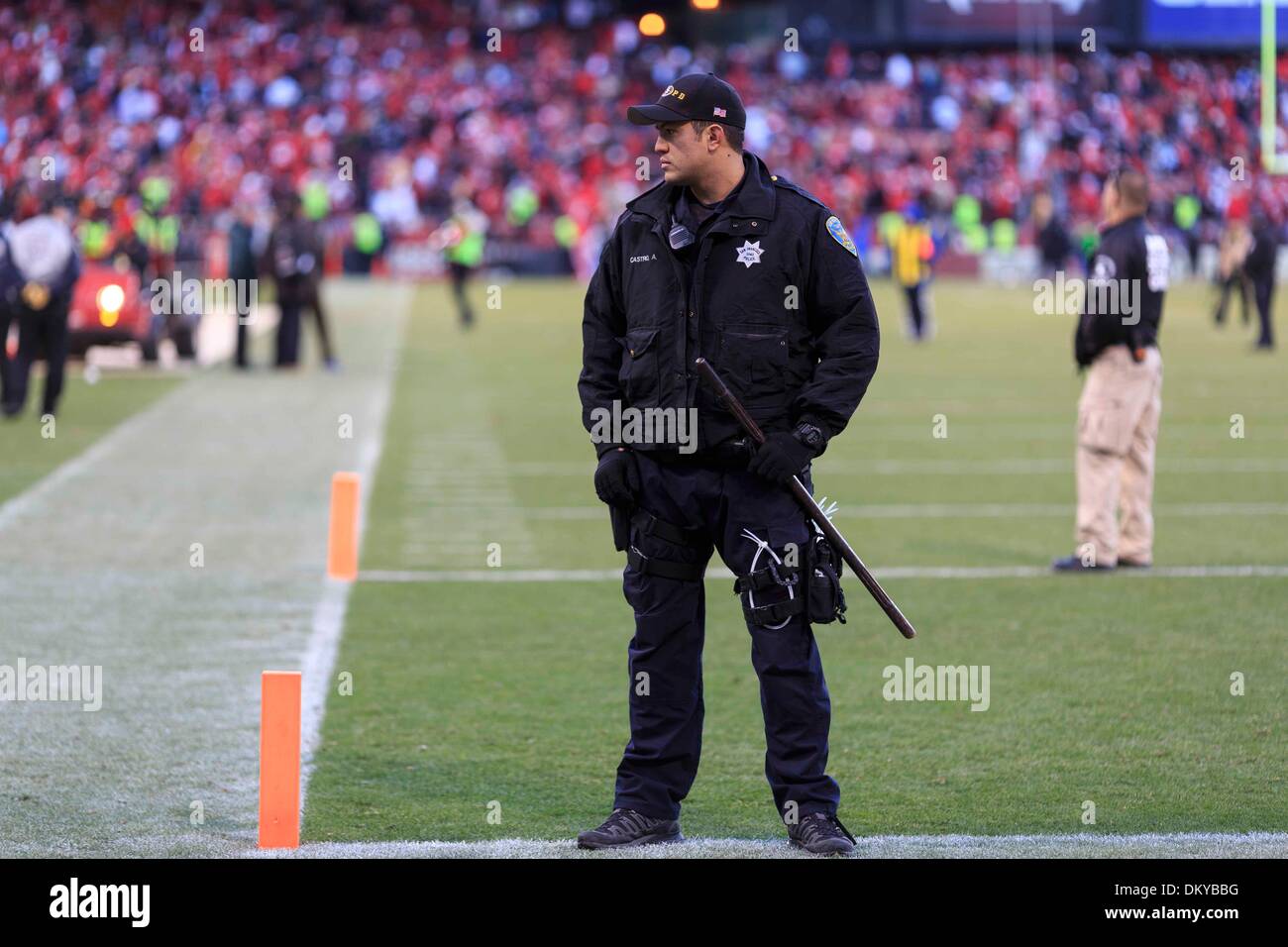 San Francisco, California, USA. 8th Dec, 2013. Officer ANDY CASTRO mans ...