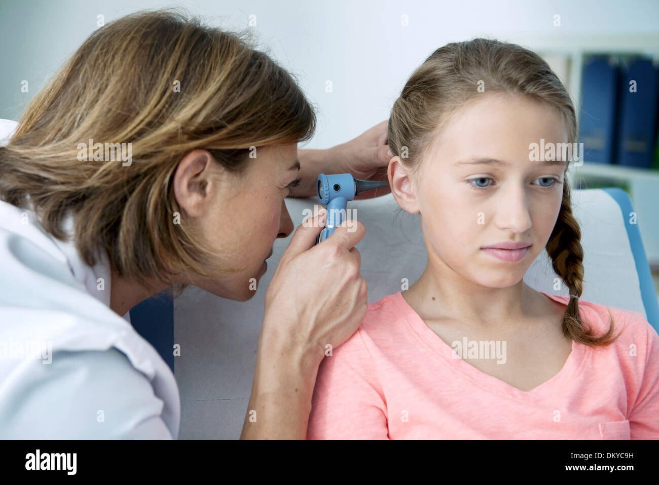 Nose and throat examination otoscope pediatrics pediatrician hi-res ...