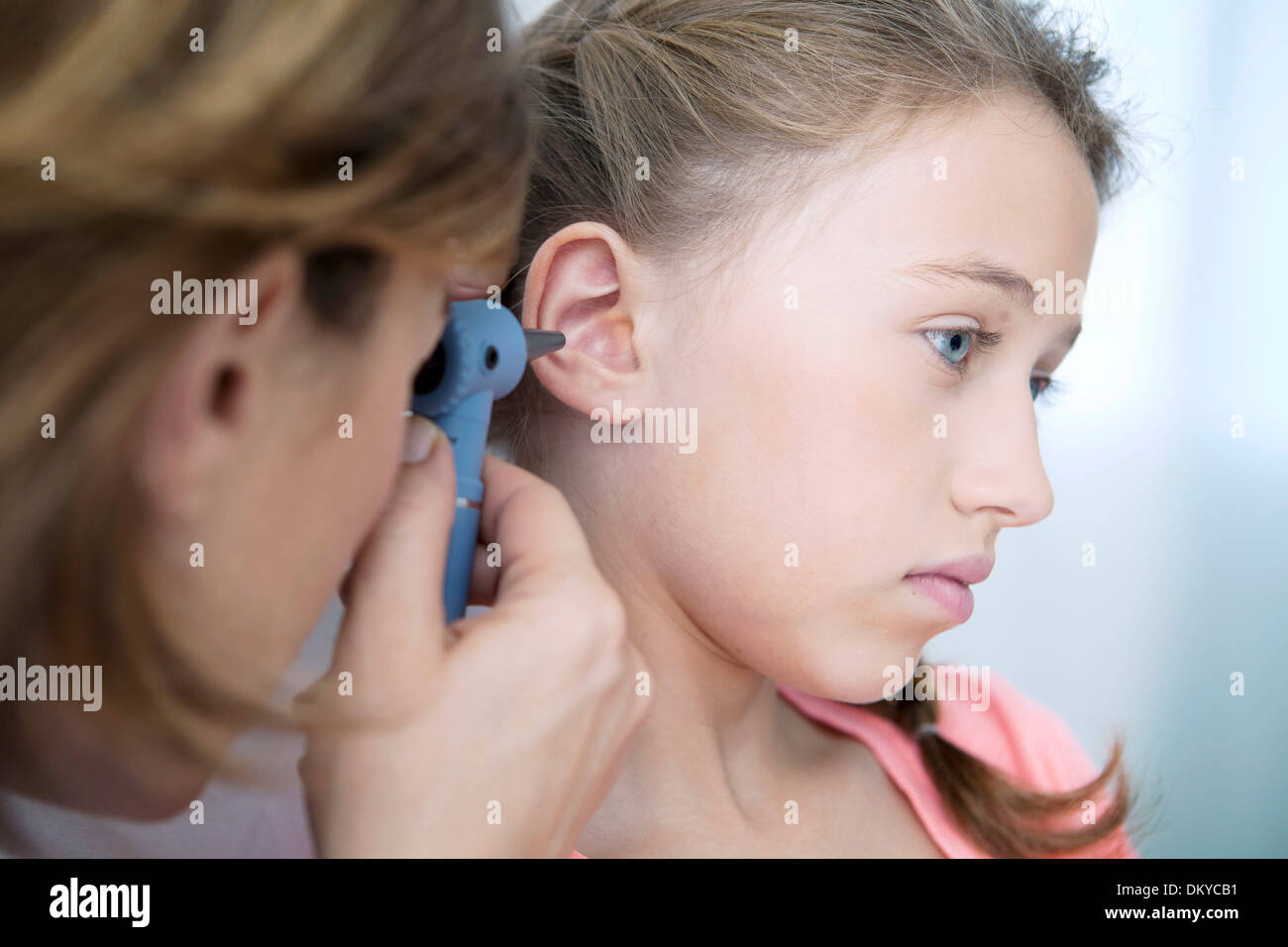 Nose and throat examination otoscope pediatrics pediatrician hi-res ...