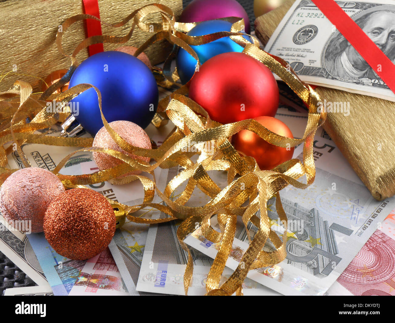 Christmas gift box with christmas balls and money Stock Photo - Alamy