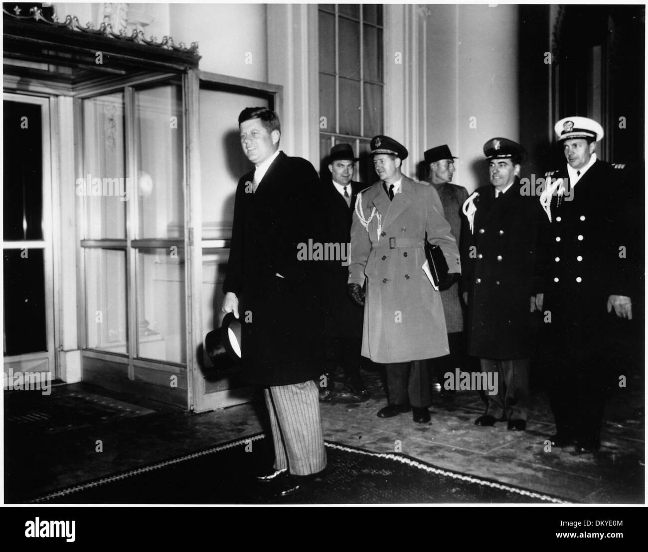 President John F. Kennedy returns to the White House after attending ...