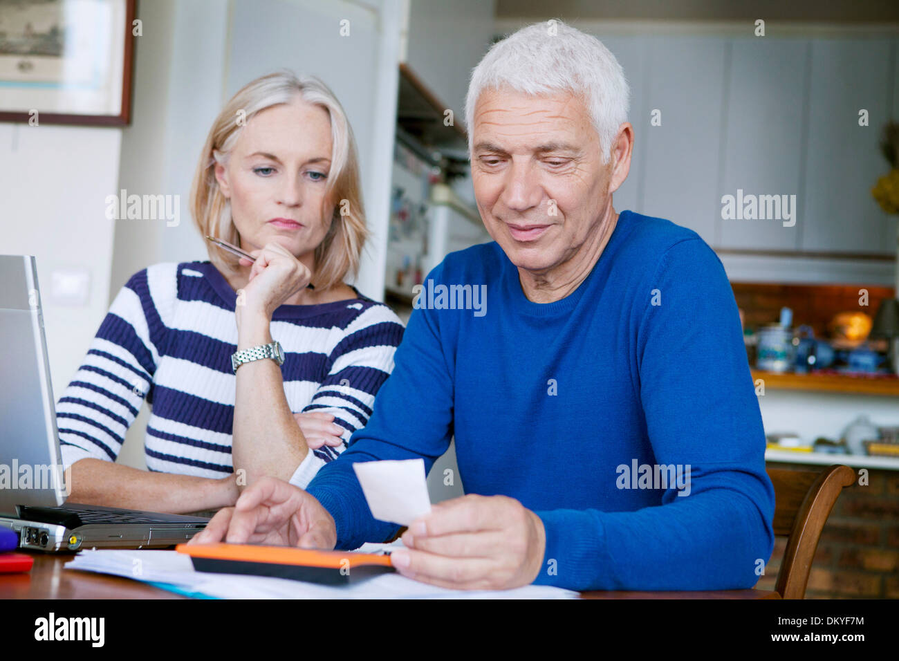 COUPLE DOING PAPERWORK Stock Photo - Alamy