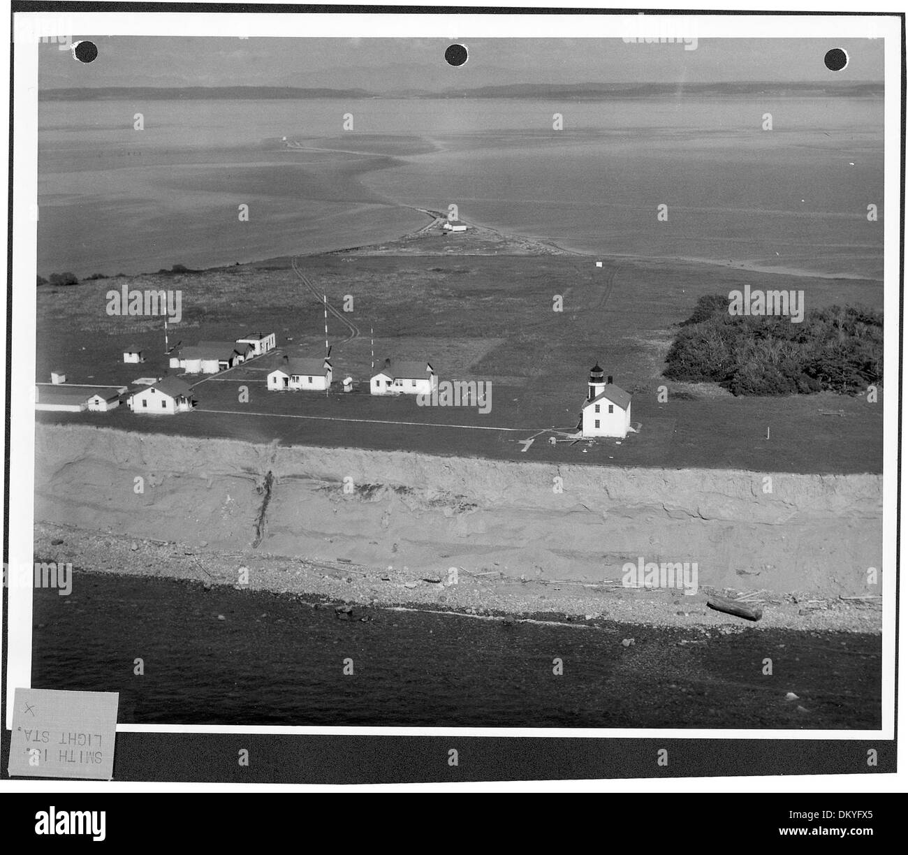 A photograph from around 1948 showing the Smith Island Lighthouse along ...