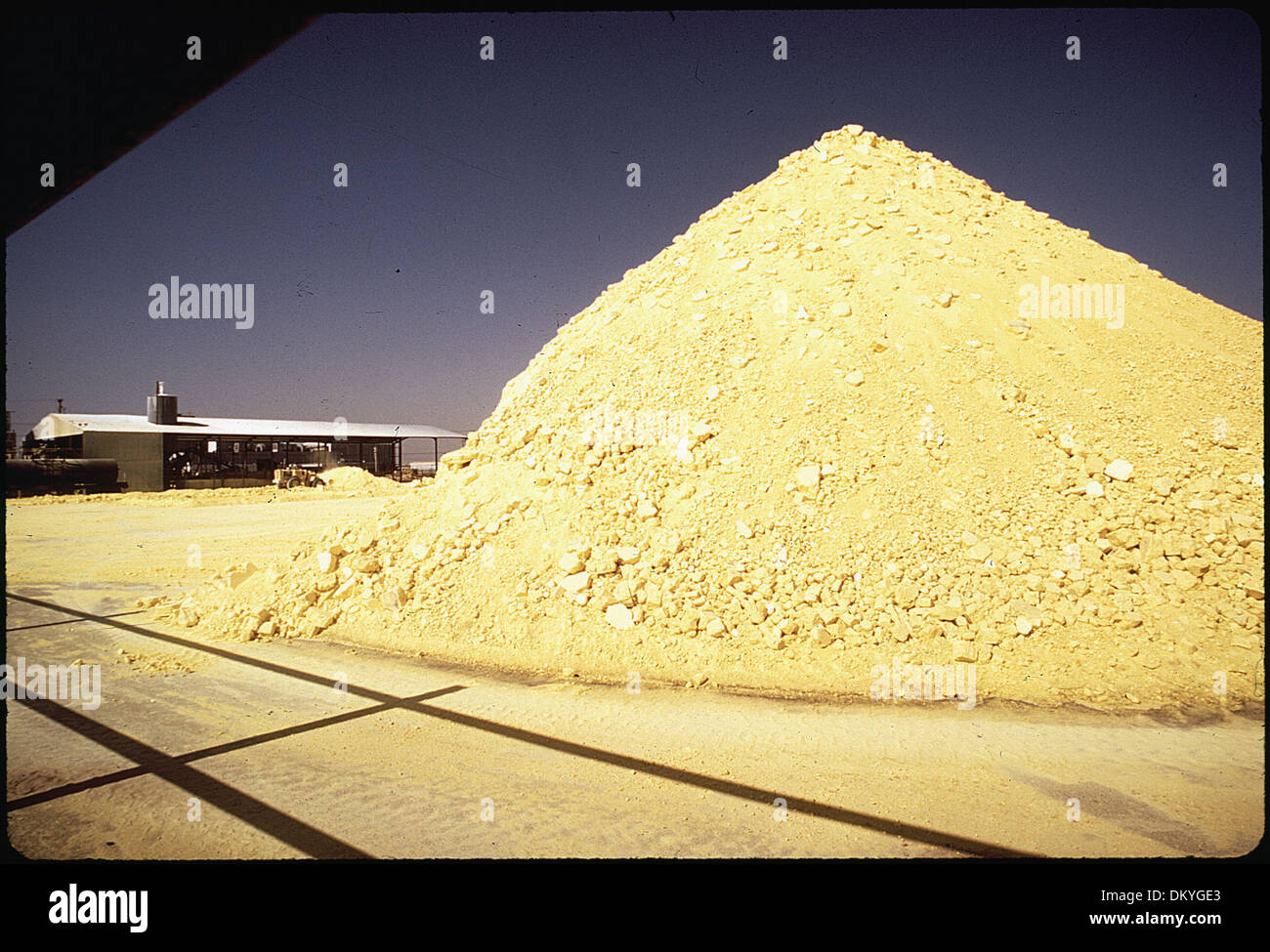 This image shows a sulfur pile at a plant. Sulfur is an essential ...