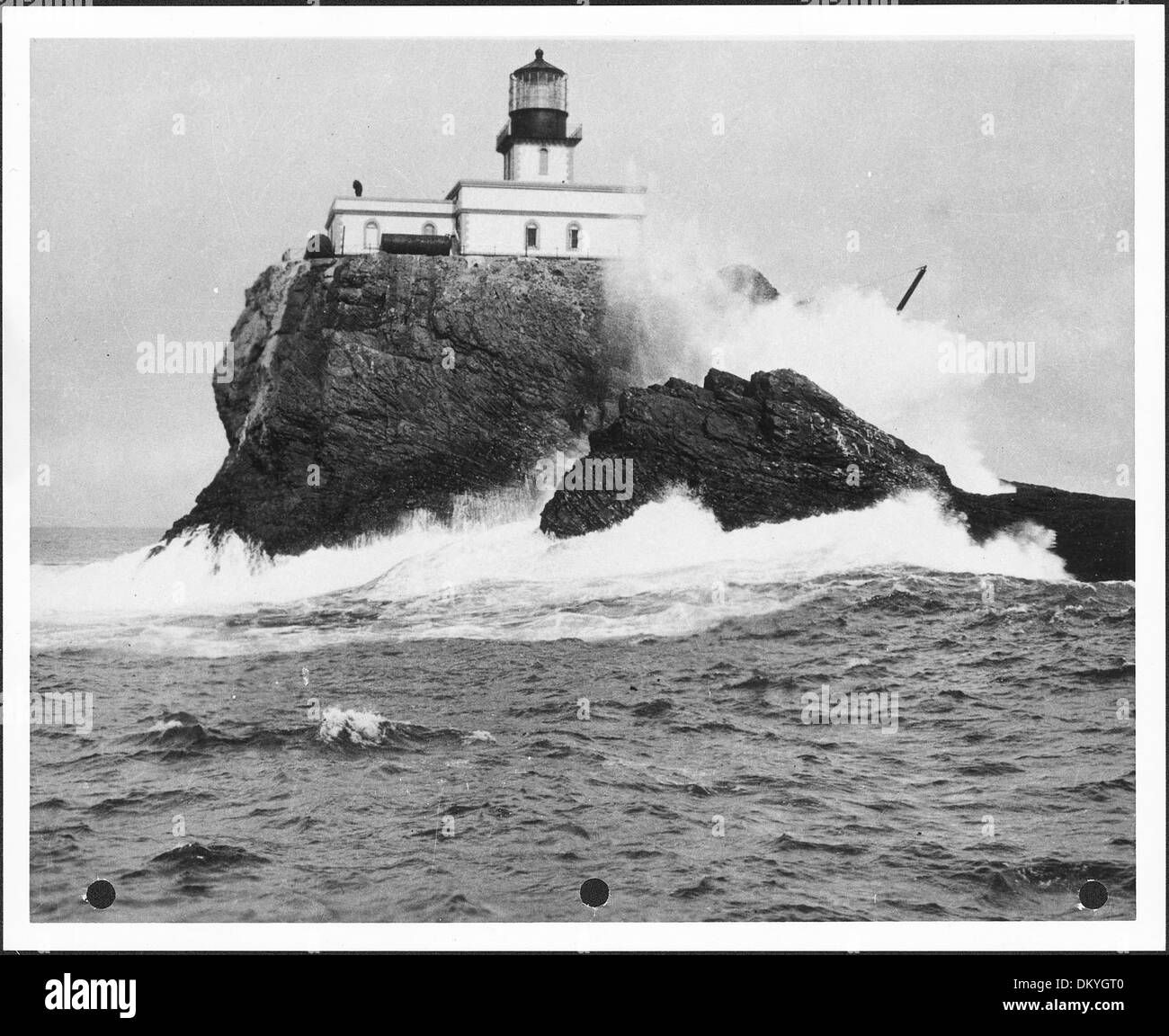 The Tillamook Rock Lighthouse, built between 1943 and 1953, is depicted ...