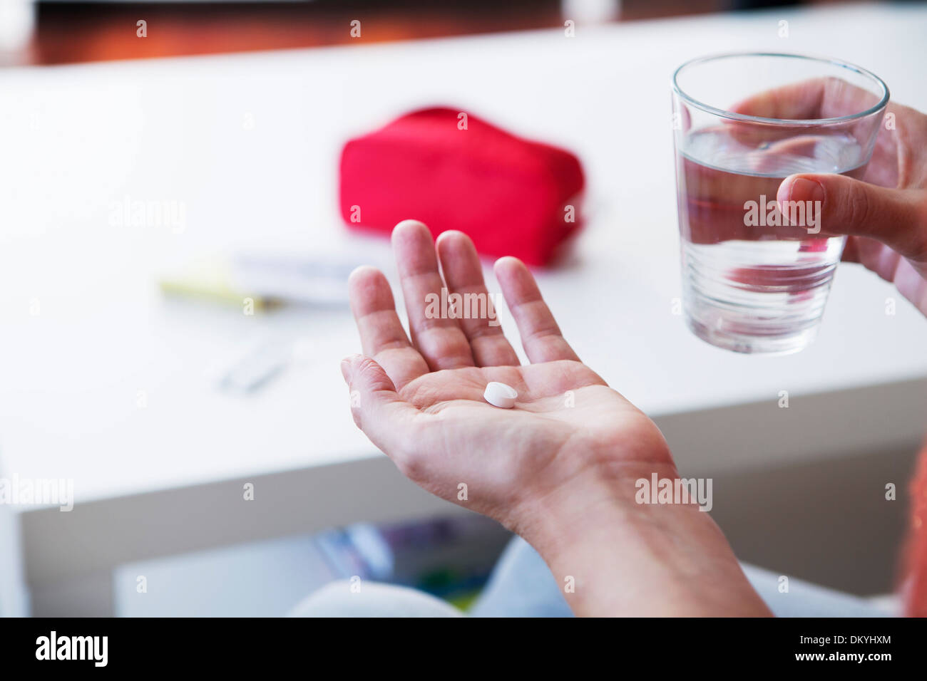 WOMAN TAKING MEDICATION Stock Photo - Alamy