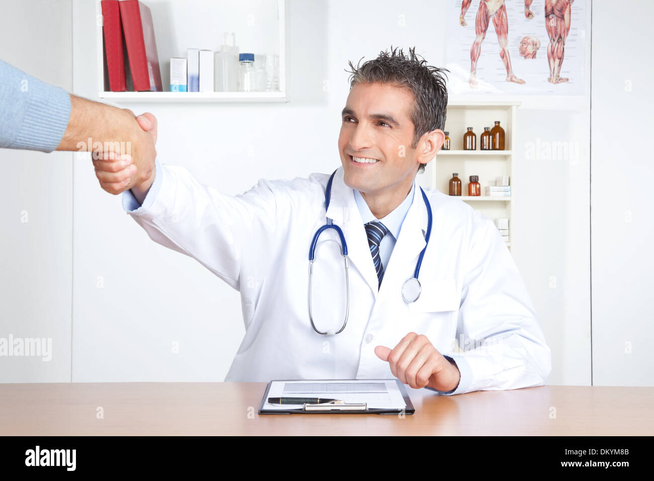 Doctor And Patient Shake Hands Stock Photo - Alamy
