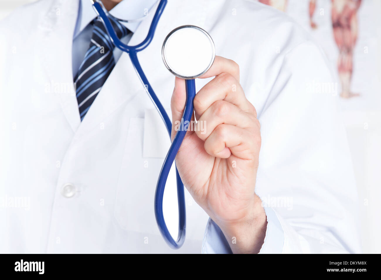 Male Doctor Holding Stethoscope Stock Photo - Alamy