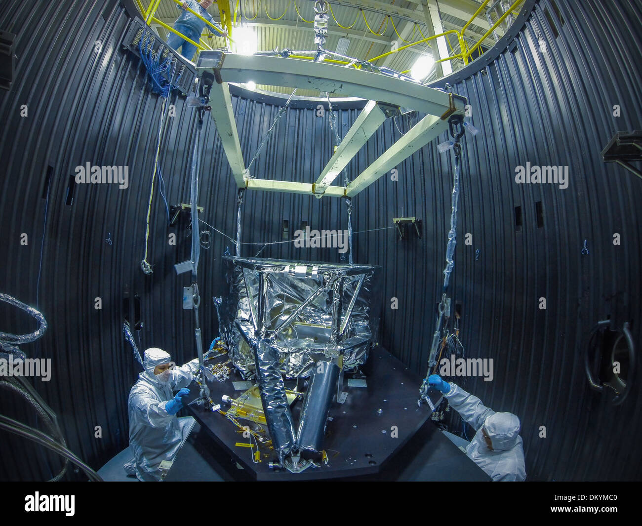 Technicians at NASA's Goddard Space Flight Center prepare the Webb ...