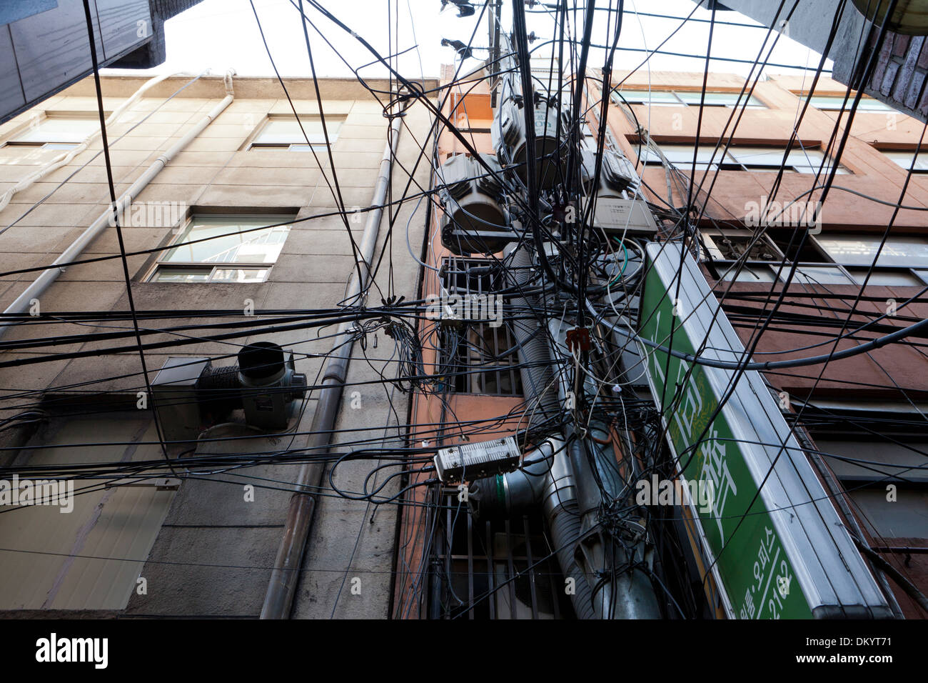 Cluttered telephone and electrical utility wiring - Seoul, South Korea ...