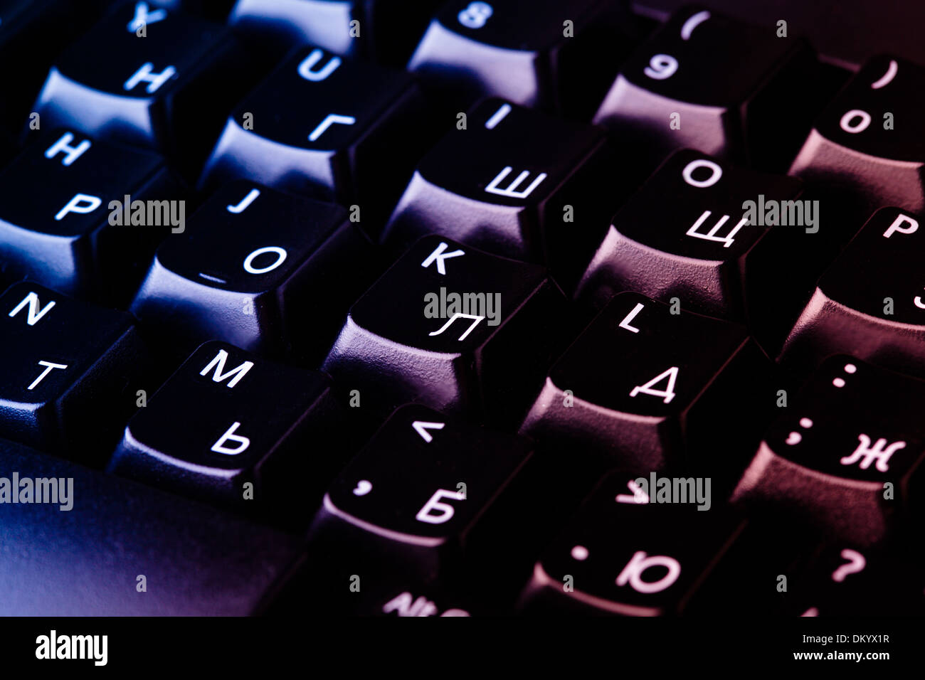 Black computer keyboard close up under lights Stock Photo - Alamy