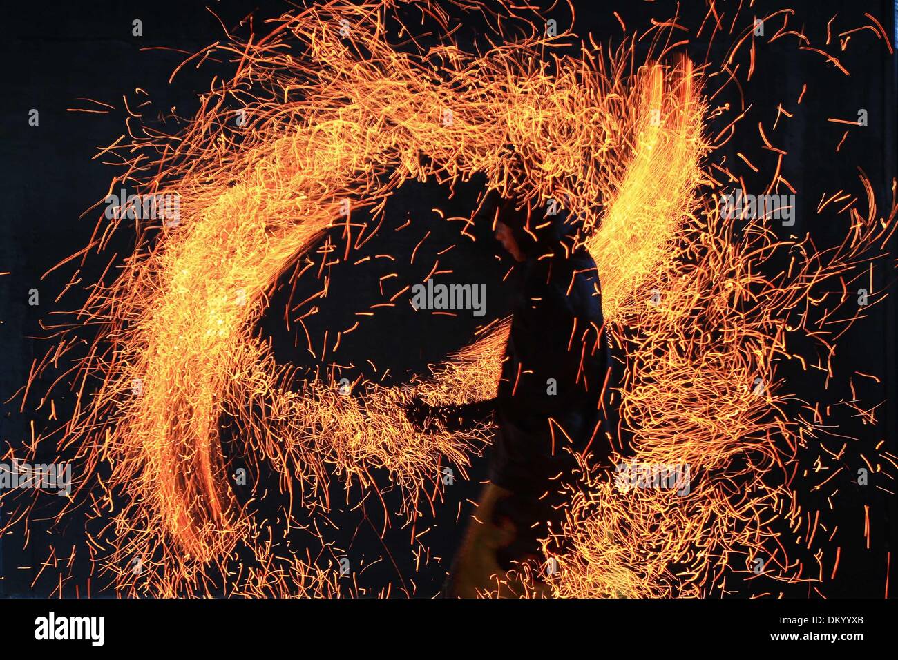Pasay City, Philippines. 10th Dec, 2013. A fire dancer performs during ...