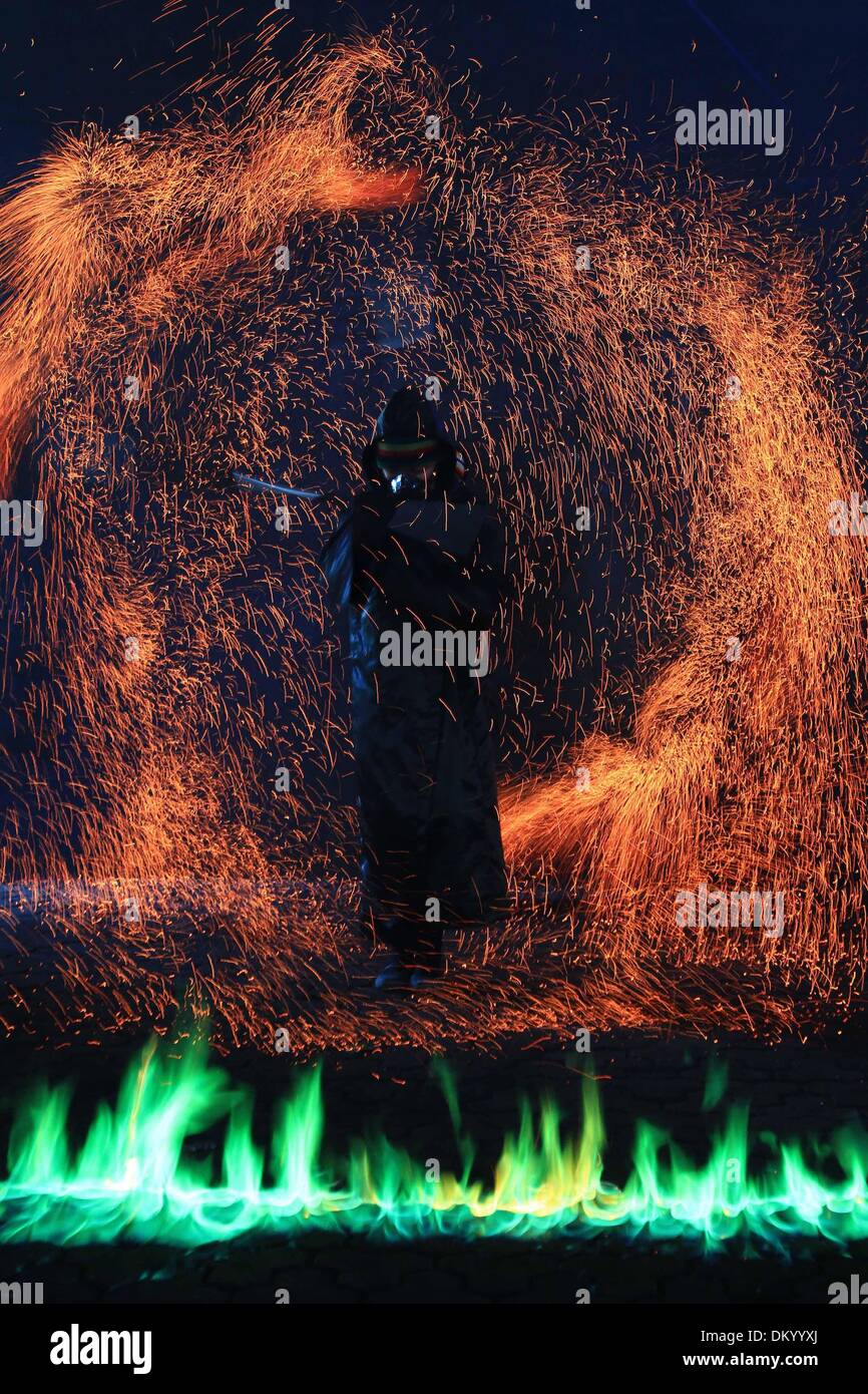 Pasay City, Philippines. 10th Dec, 2013. A fire dancer performs during ...