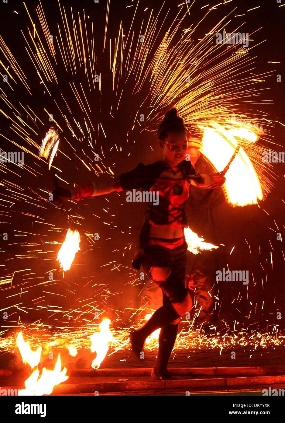 Pasay City, Philippines. 10th Dec, 2013. A fire dancer performs during ...