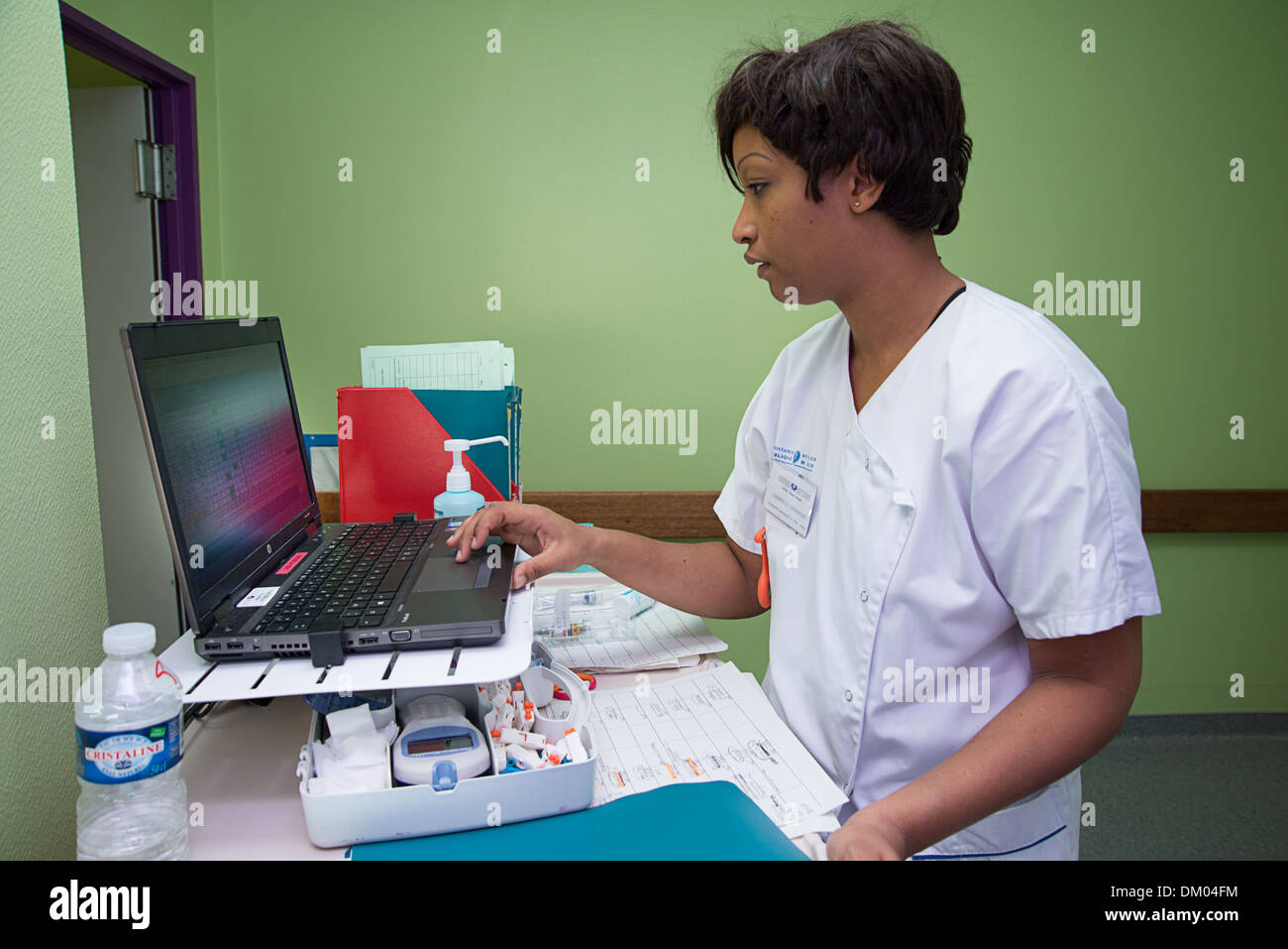 Nurse Taking A Test Computer
